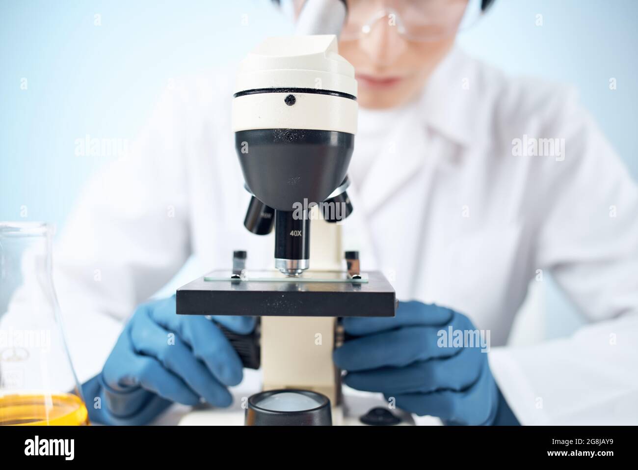 Woman in white coat science research experiment professional Stock ...