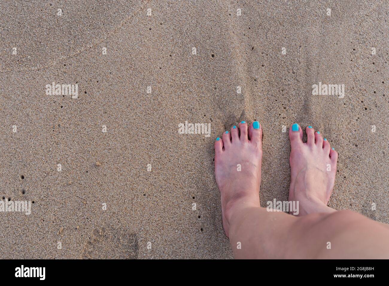 Woman feet red toenails on hi-res stock photography and images - Alamy