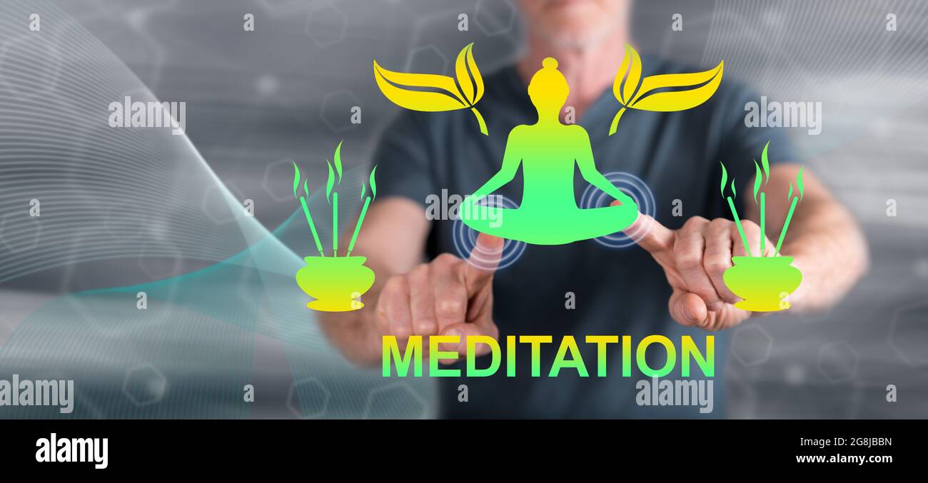 Man touching a meditation concept on a touch screen with his fingers ...