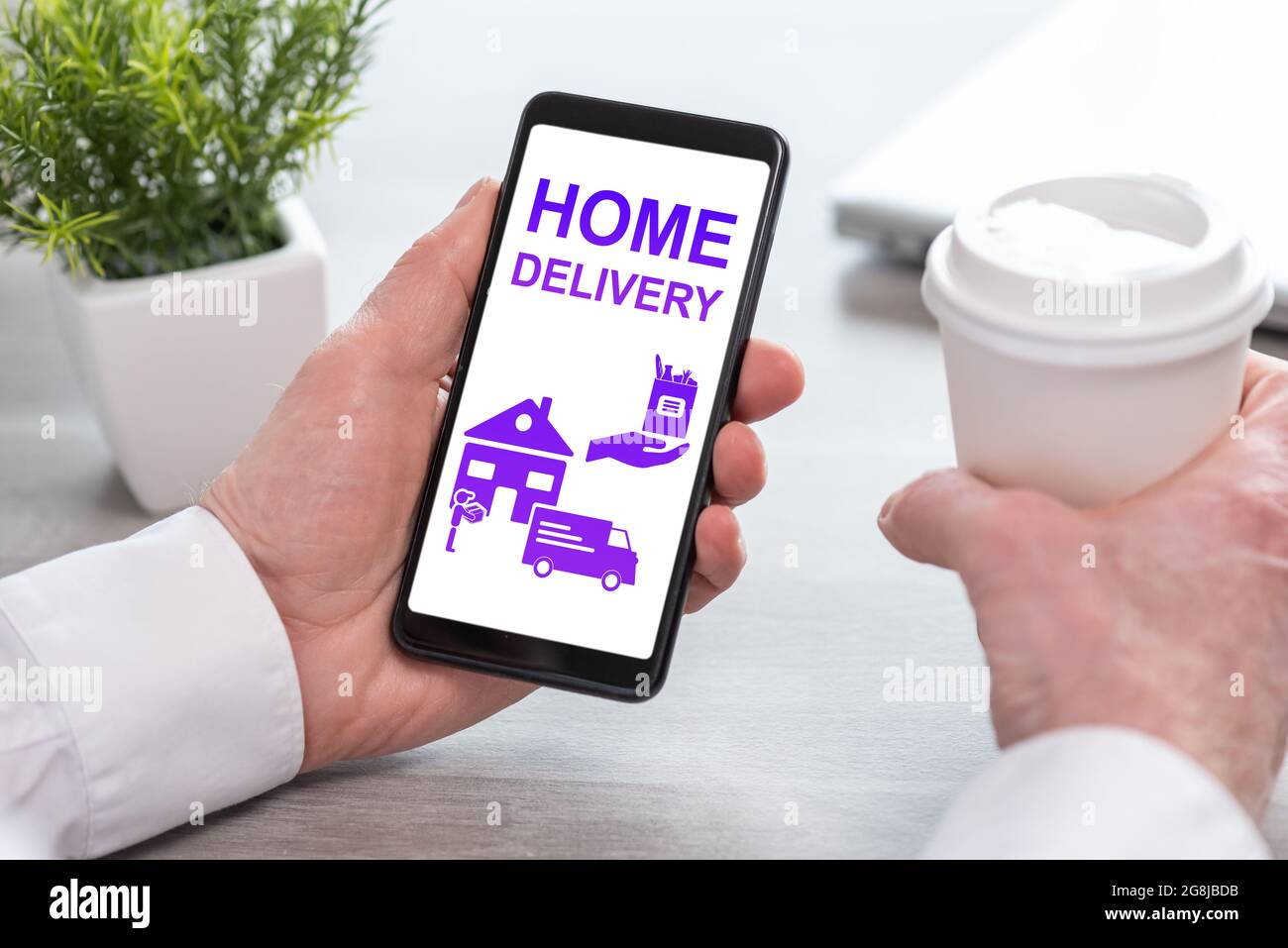 Smartphone screen displaying a home delivery concept Stock Photo - Alamy