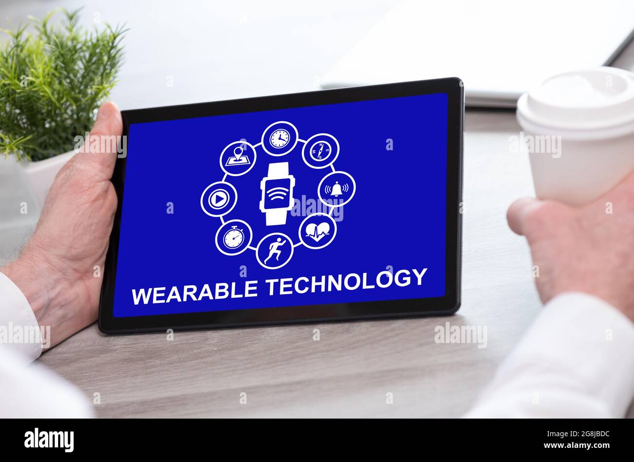 Tablet screen displaying a wearable technology concept Stock Photo - Alamy