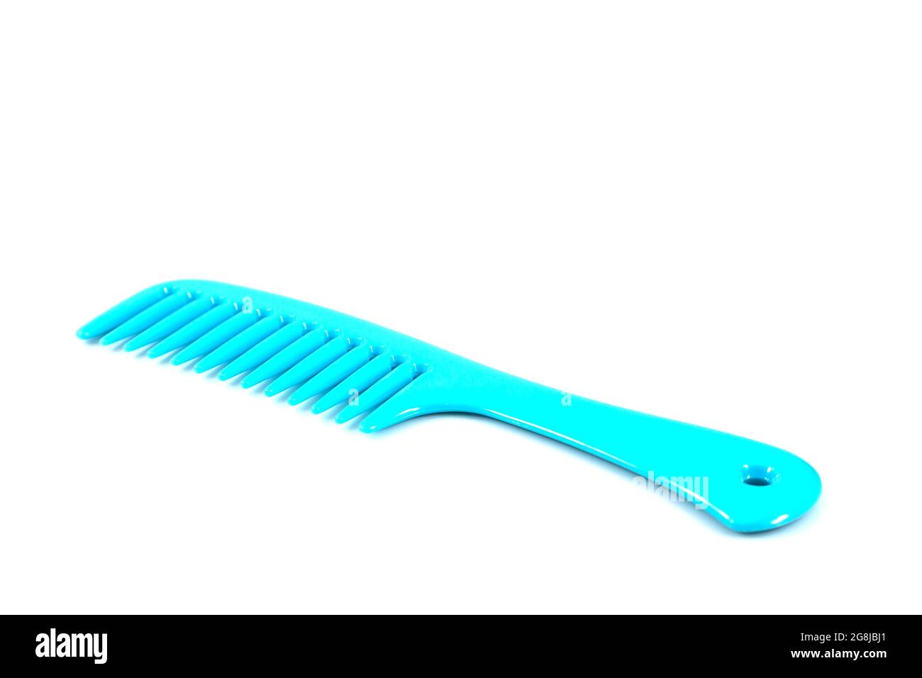 Blue comb isolated on white background Stock Photo - Alamy