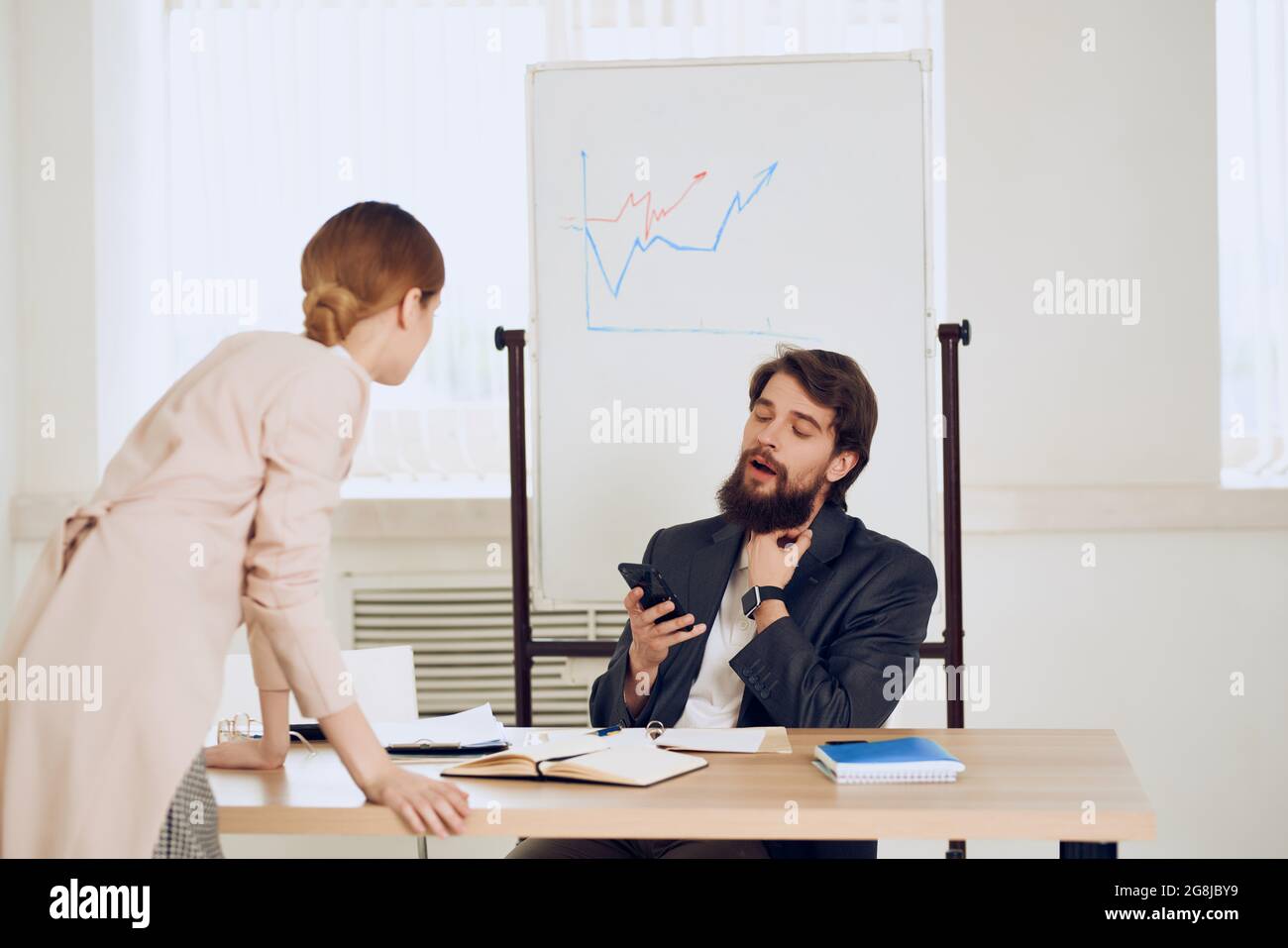 work colleagues office emotions work desk communication Stock Photo - Alamy