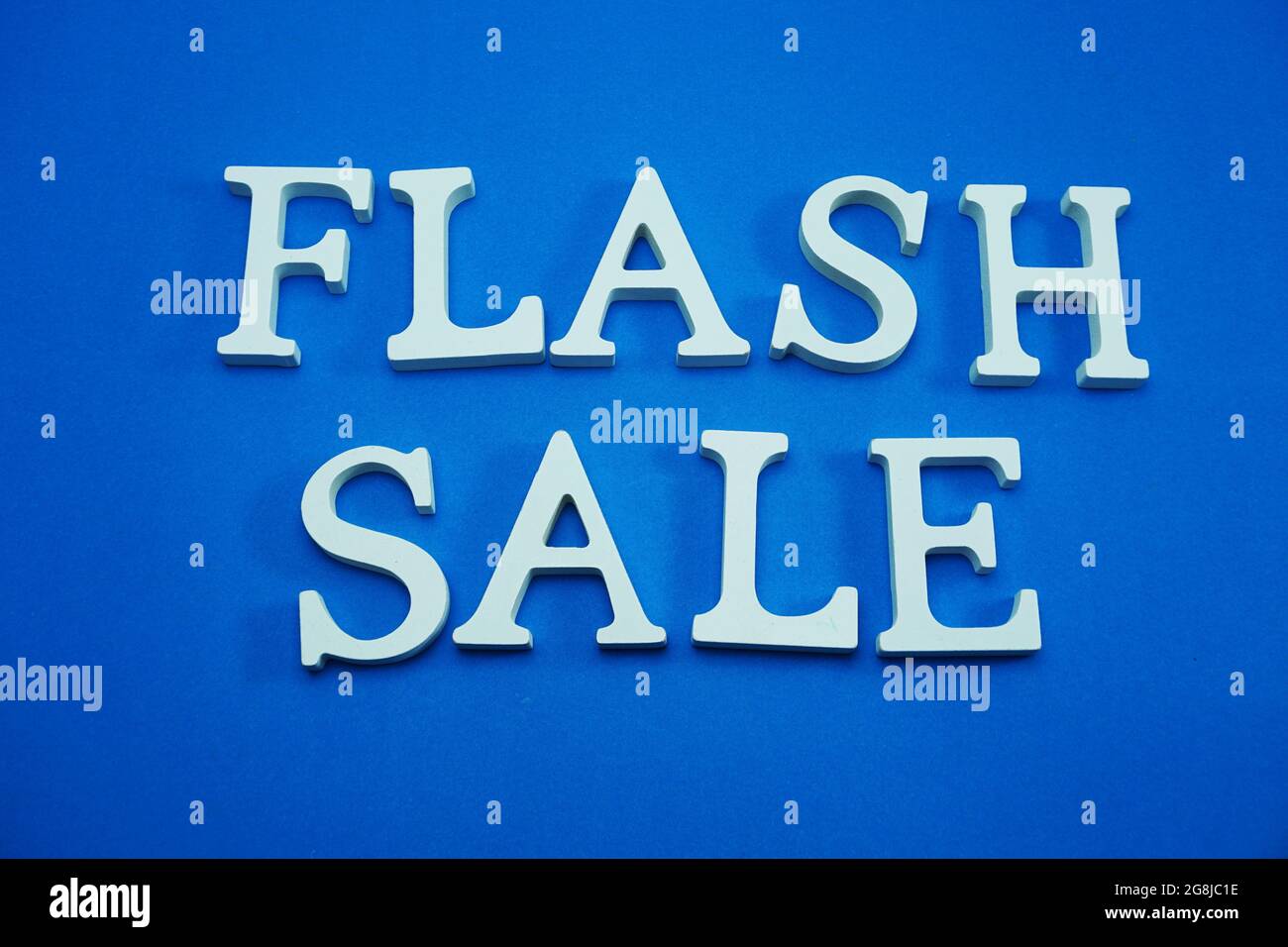 Flash Sale alphabet letters top view on blue background Stock Photo - Alamy