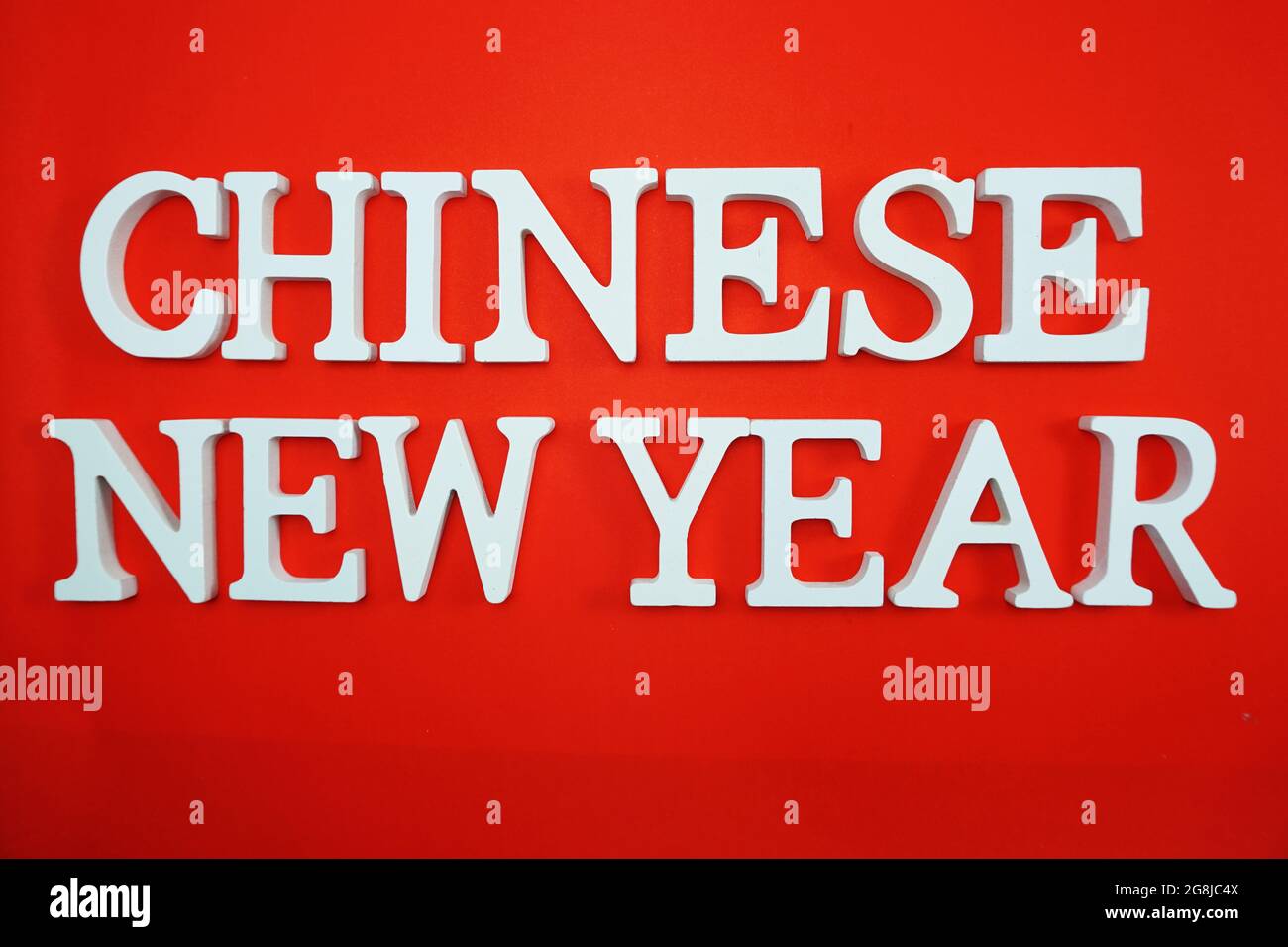 Chinese New Year alphabet letters top view on green background Stock ...