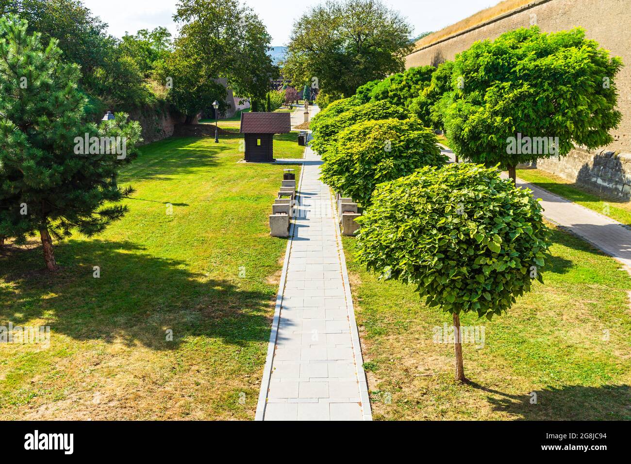 Green garden with trees and alleys in a fortress yard in Alba Iulia ...