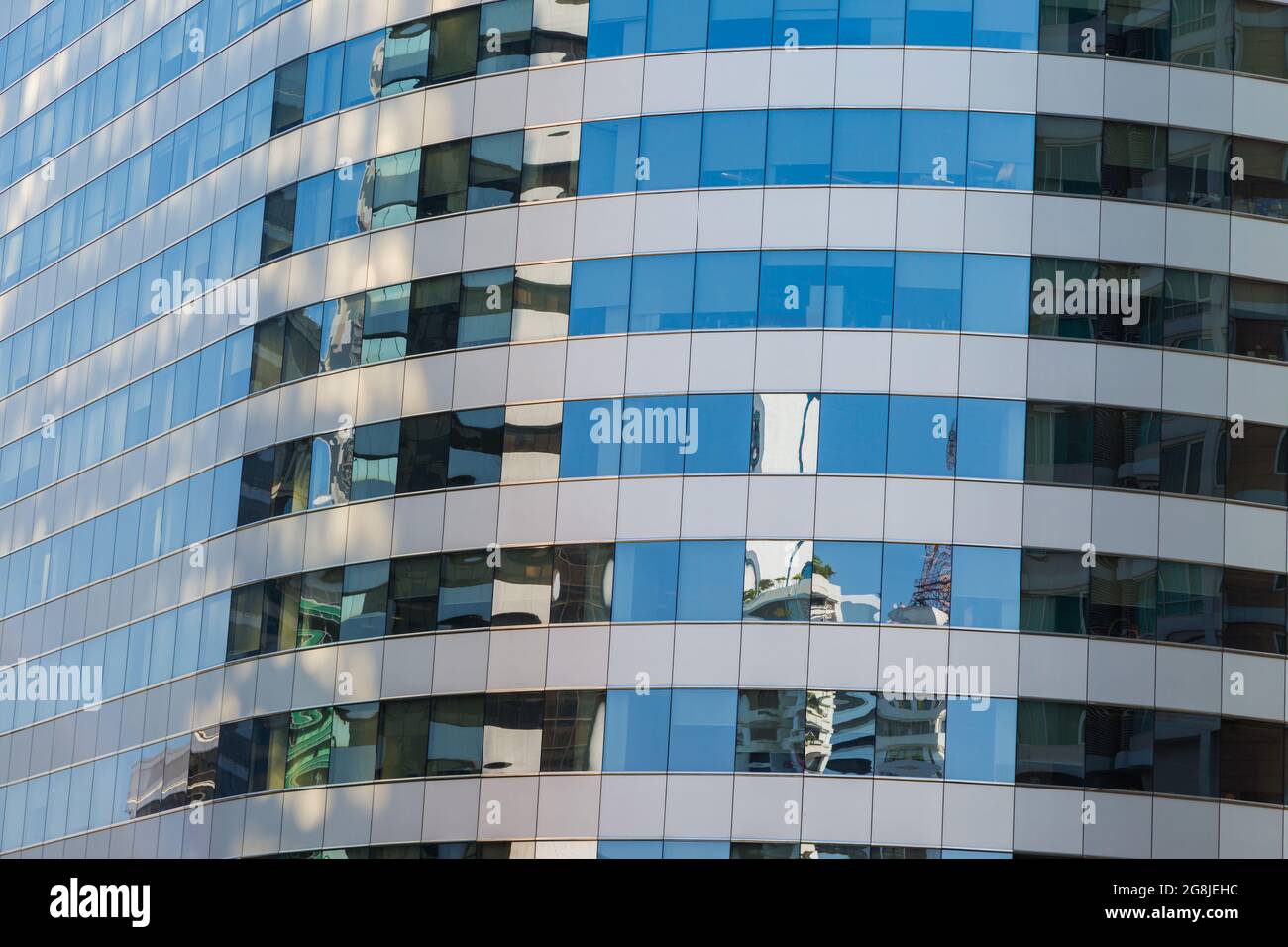 Blue glass Business building in the city Stock Photo - Alamy