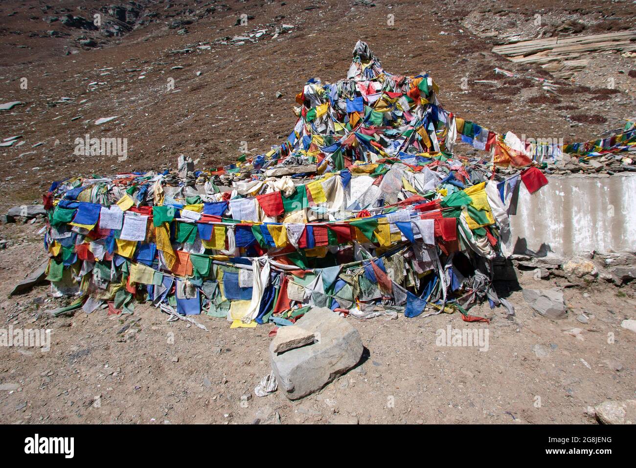 A ritual site with colorful flags in the Indian Himalayas Stock Photo ...