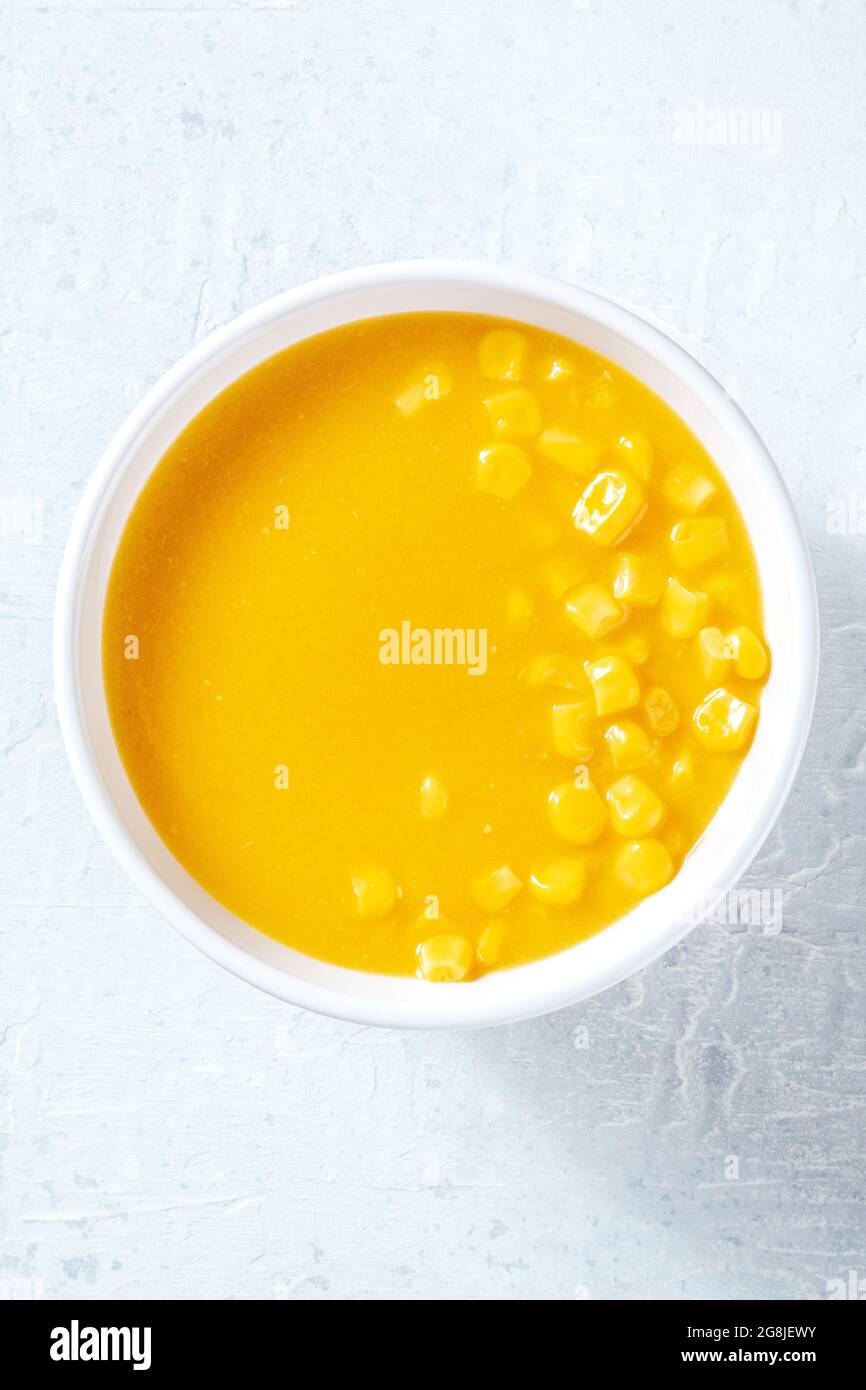 Sweet corn puree, overhead shot. Organic vegan chowder with a place for ...