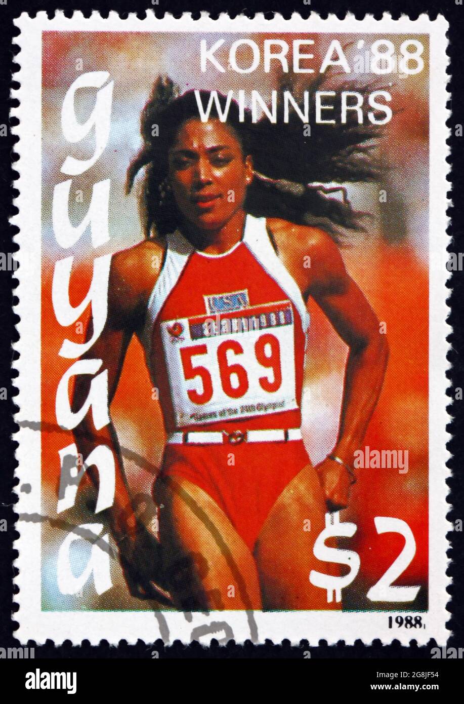 GUYANA - CIRCA 1988: a stamp printed in Guyana shows Florence Griffith ...