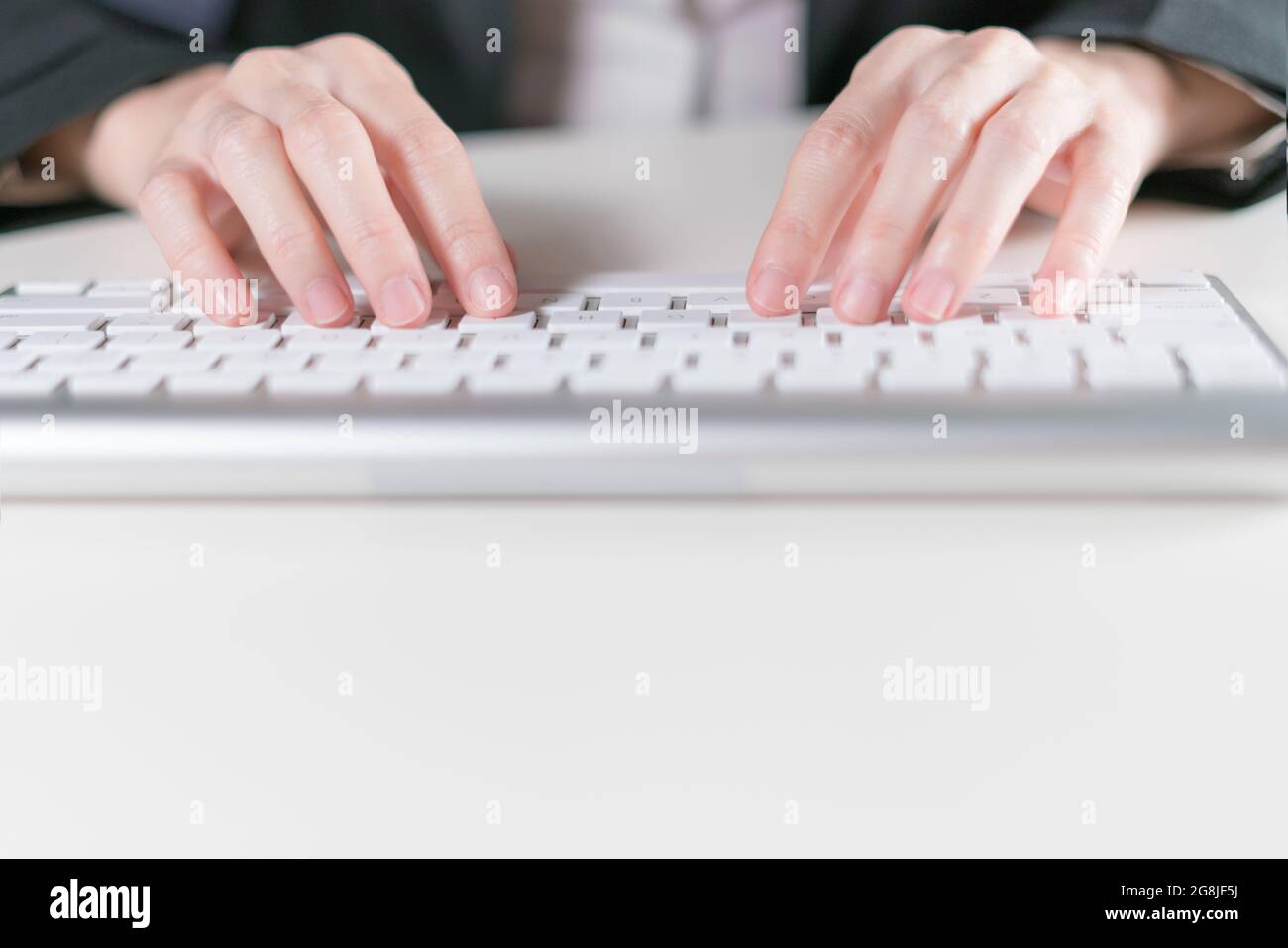 Freelance worker using computer typing hi-res stock photography and ...