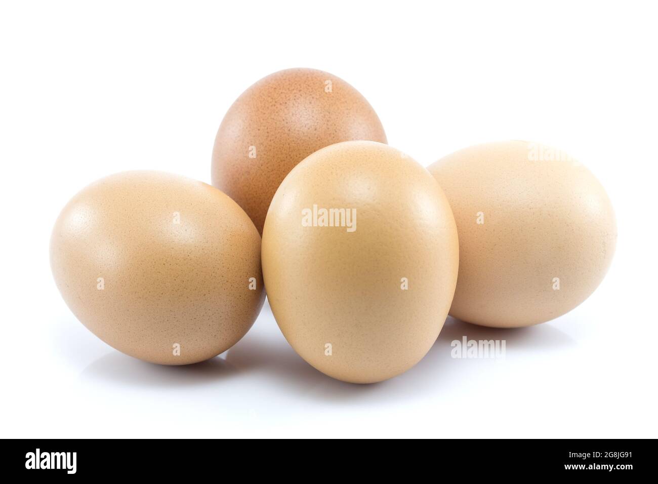 Fresh three eggs isolated on white background Stock Photo - Alamy