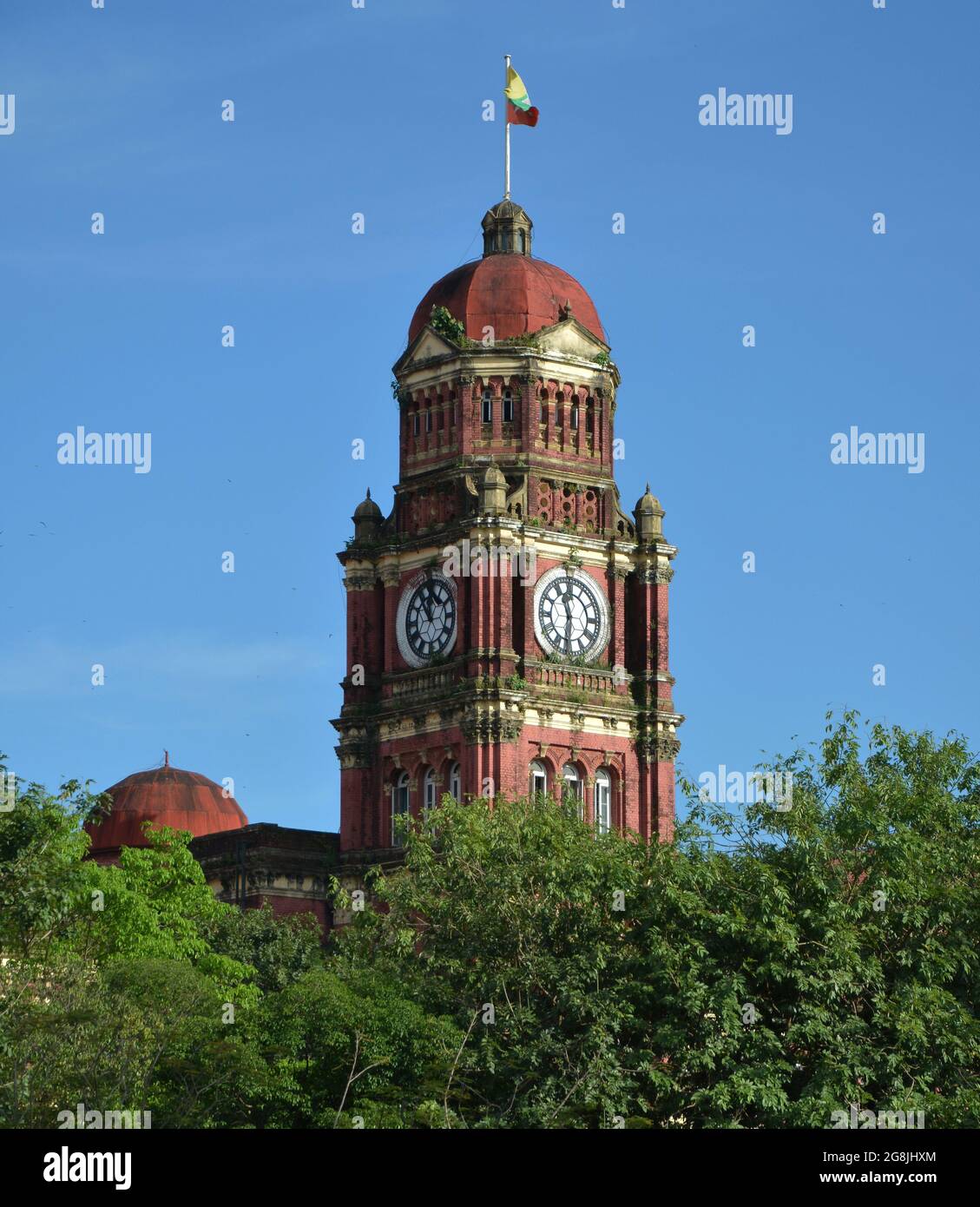 Clock tower of the British colonial era High Court building in Yangon ...