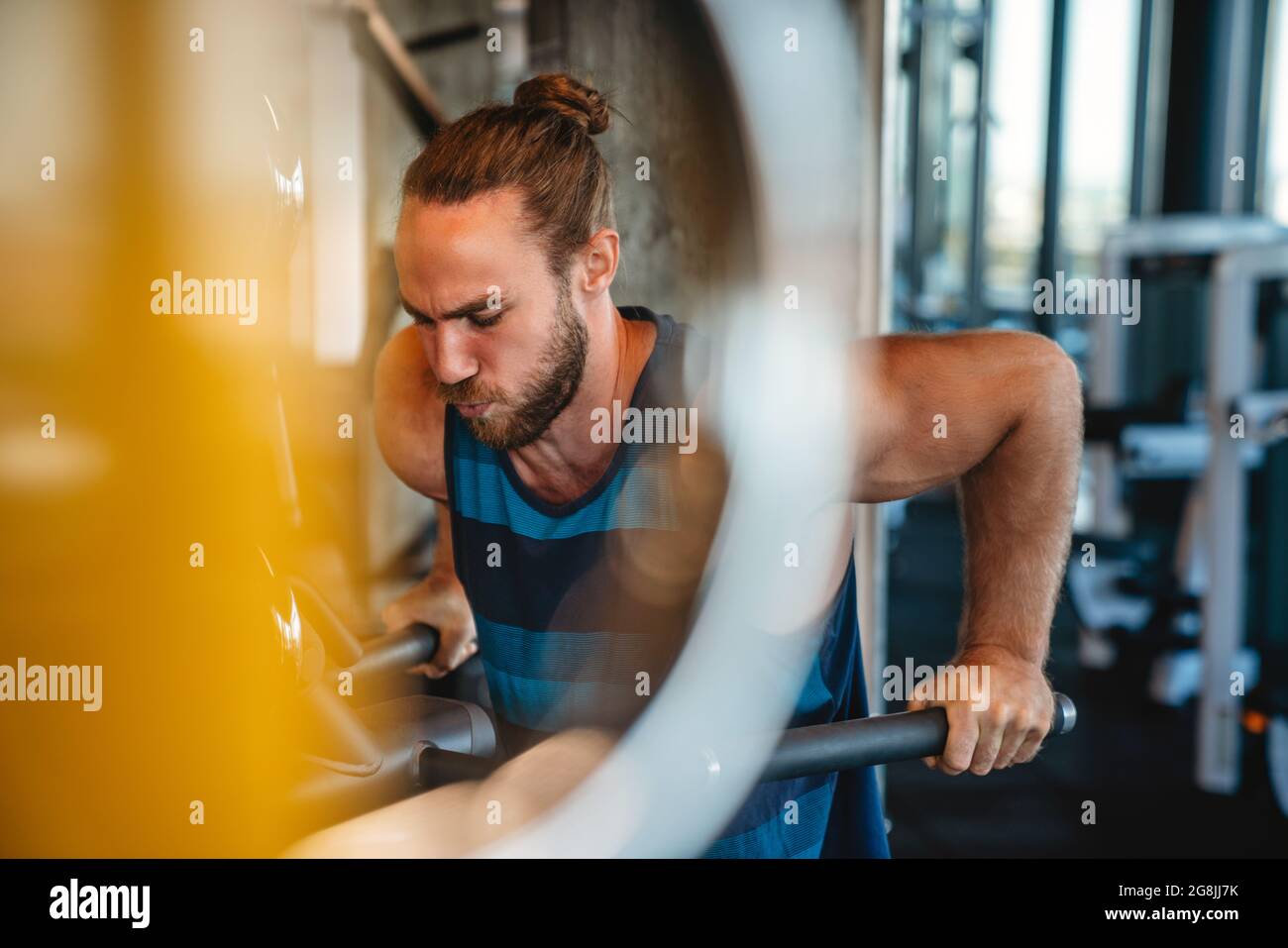 Strong man exercising gym muscular sport hi-res stock photography and ...