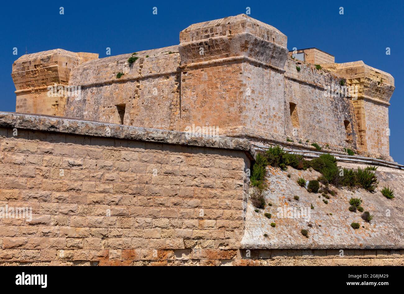 The ancient stone tower of St. Lucian and the fort over the bay ...