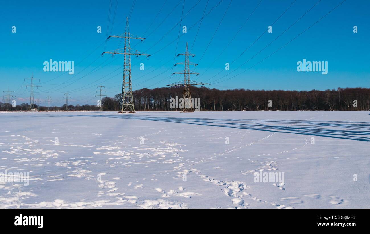 Electric wires covered in snow hi-res stock photography and images - Alamy