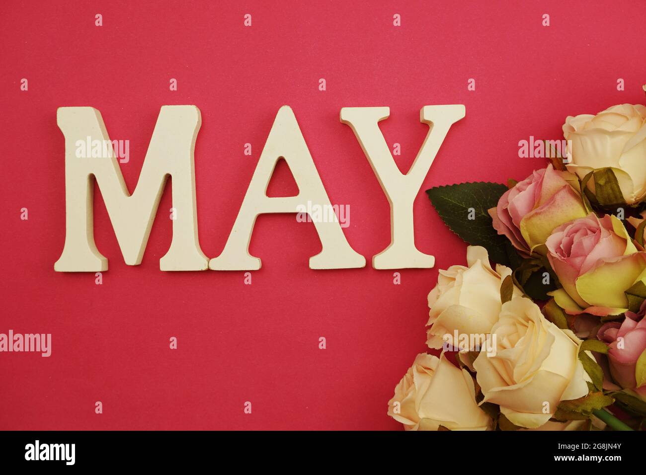 May alphabet letter with space copy on pink background Stock Photo - Alamy