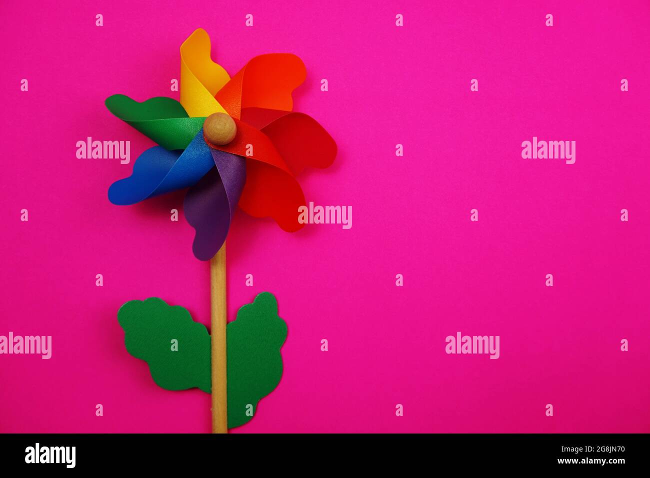 colorful pinwheel with space copy isolated on pink background Stock ...