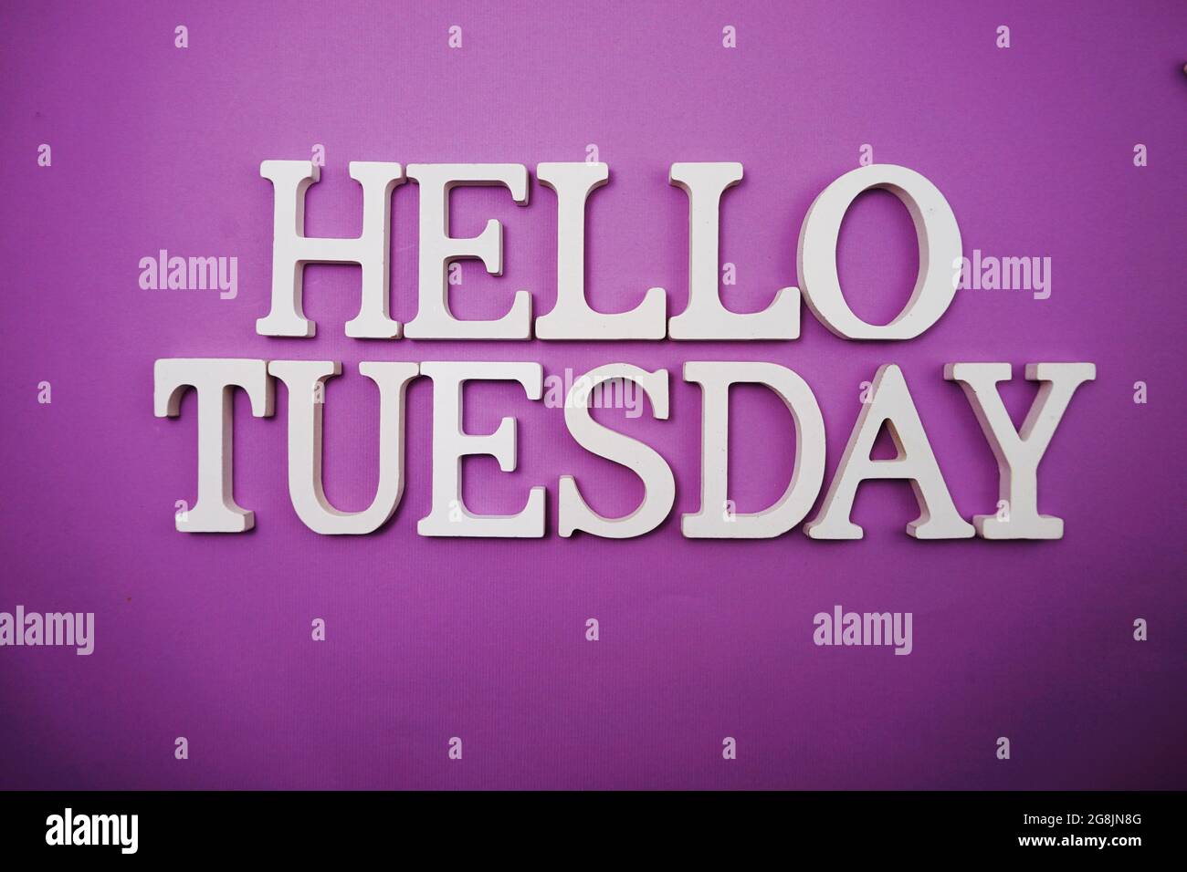 Happy Tuesday wooden letters alphabet on purple background Stock Photo ...