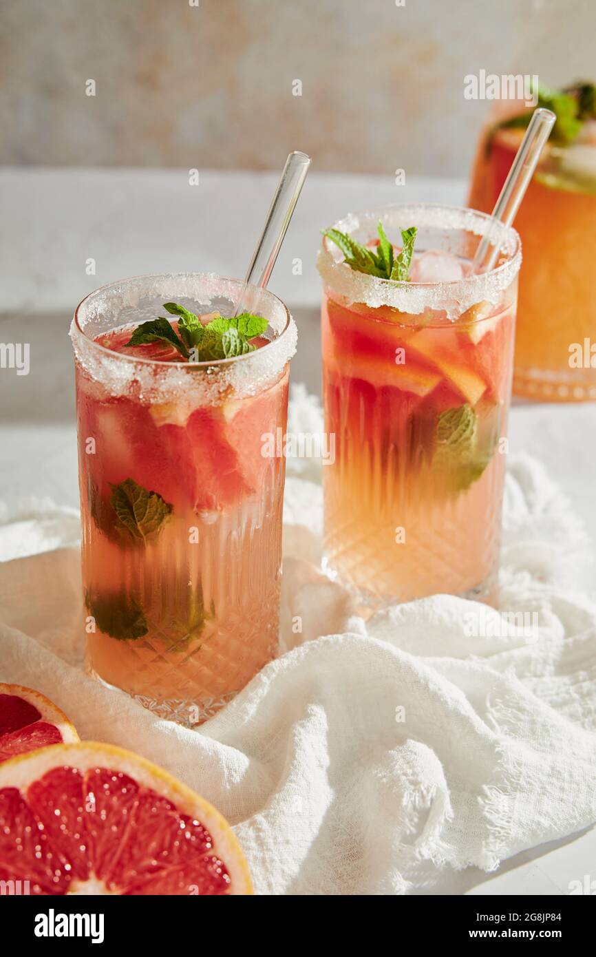 Vertical closeup shot of refreshing cold drinks with mint and ...
