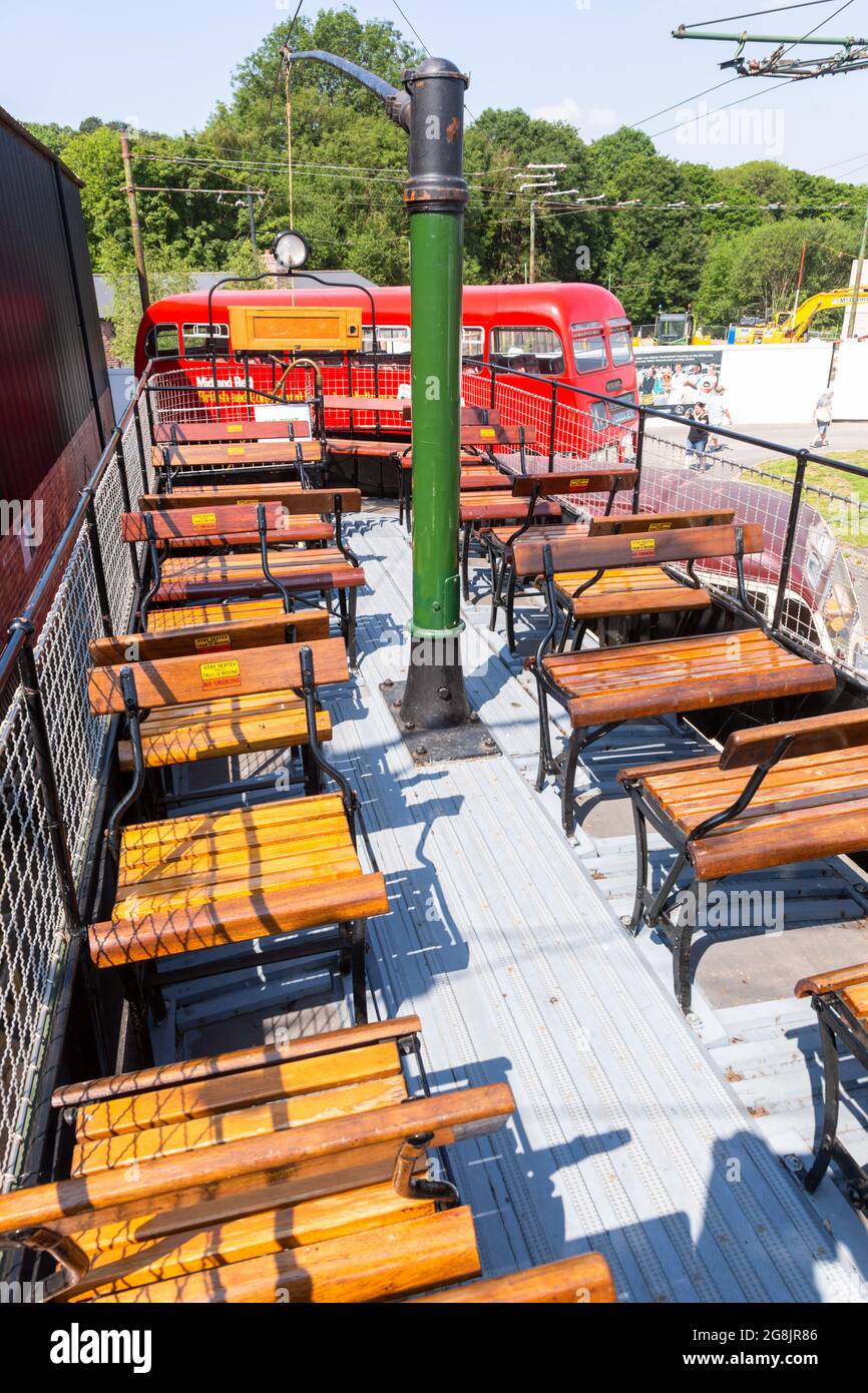 Top deck view of a tram showing basic seating Stock Photo - Alamy