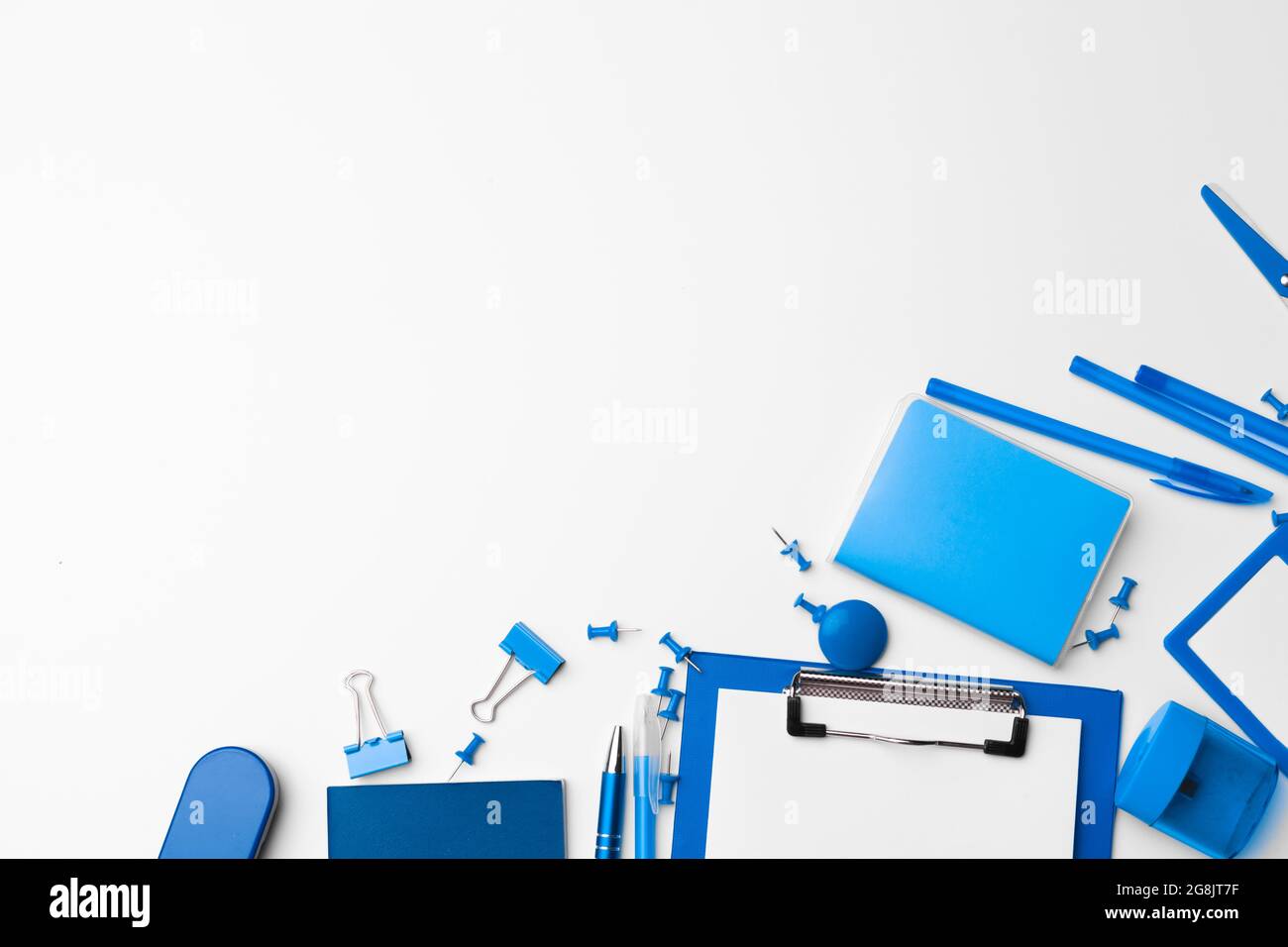 blue color stationery set as pattern with copy space on white ...