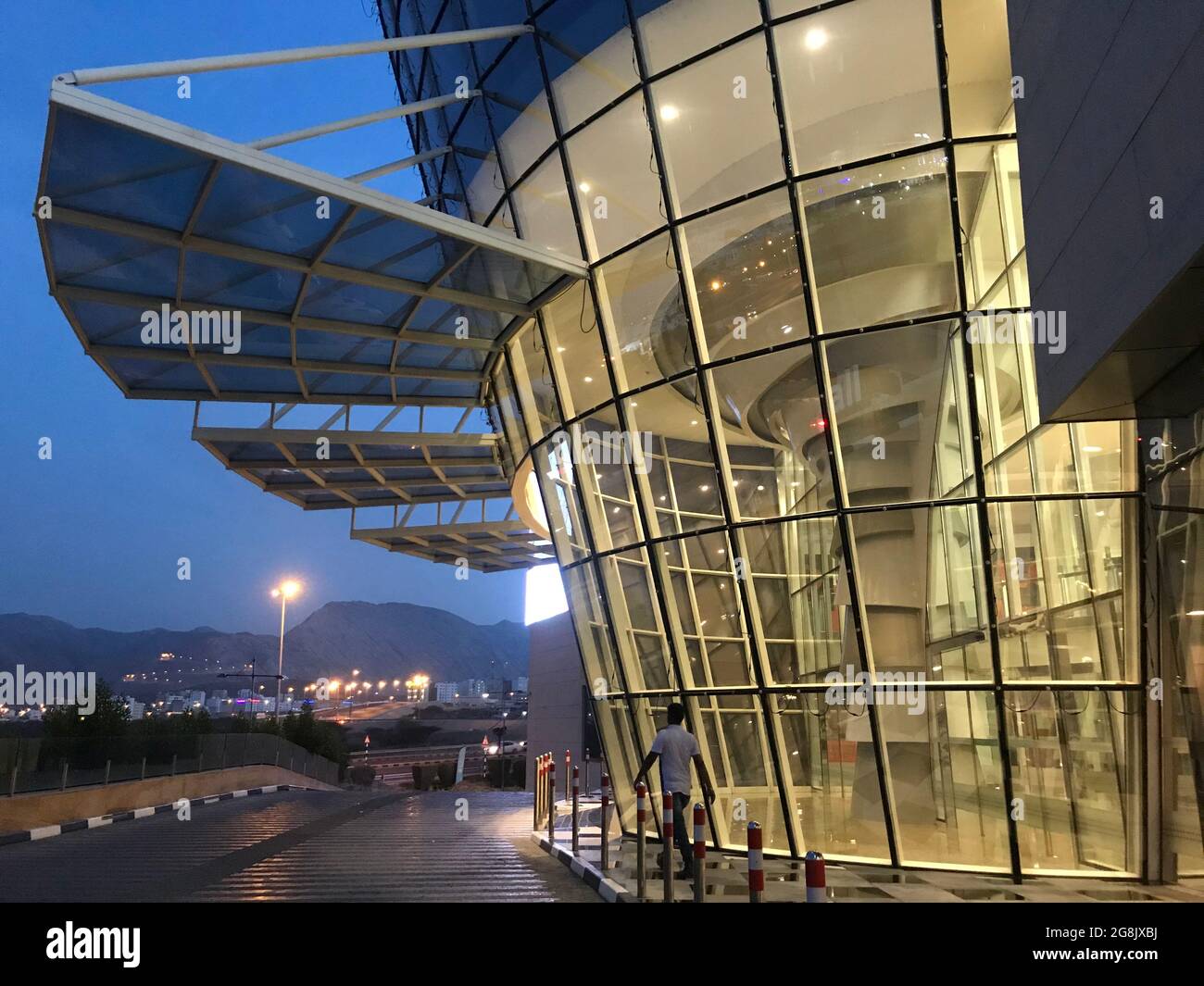 An Inclined Glass wall or Facade with aluminum framed for an high rise ...