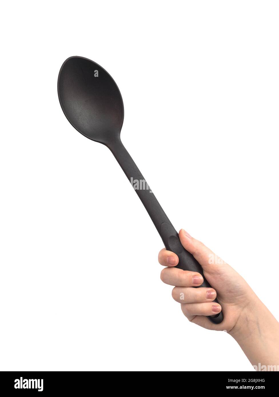 Black plastic ladle in hand, isolated on a white background Stock Photo ...