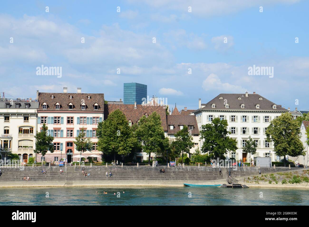 Local people hanging out on the bank of Rhine river and swimming in ...
