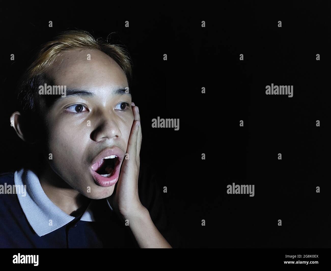 Stunned young black hi-res stock photography and images - Alamy