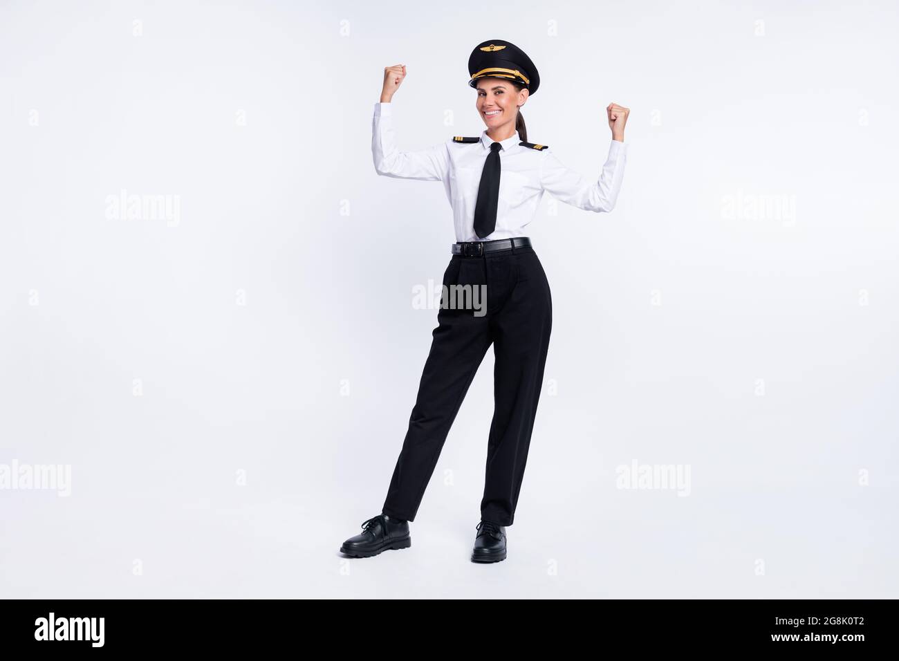 Full length body size view of pretty cool cheerful pilot girl ...