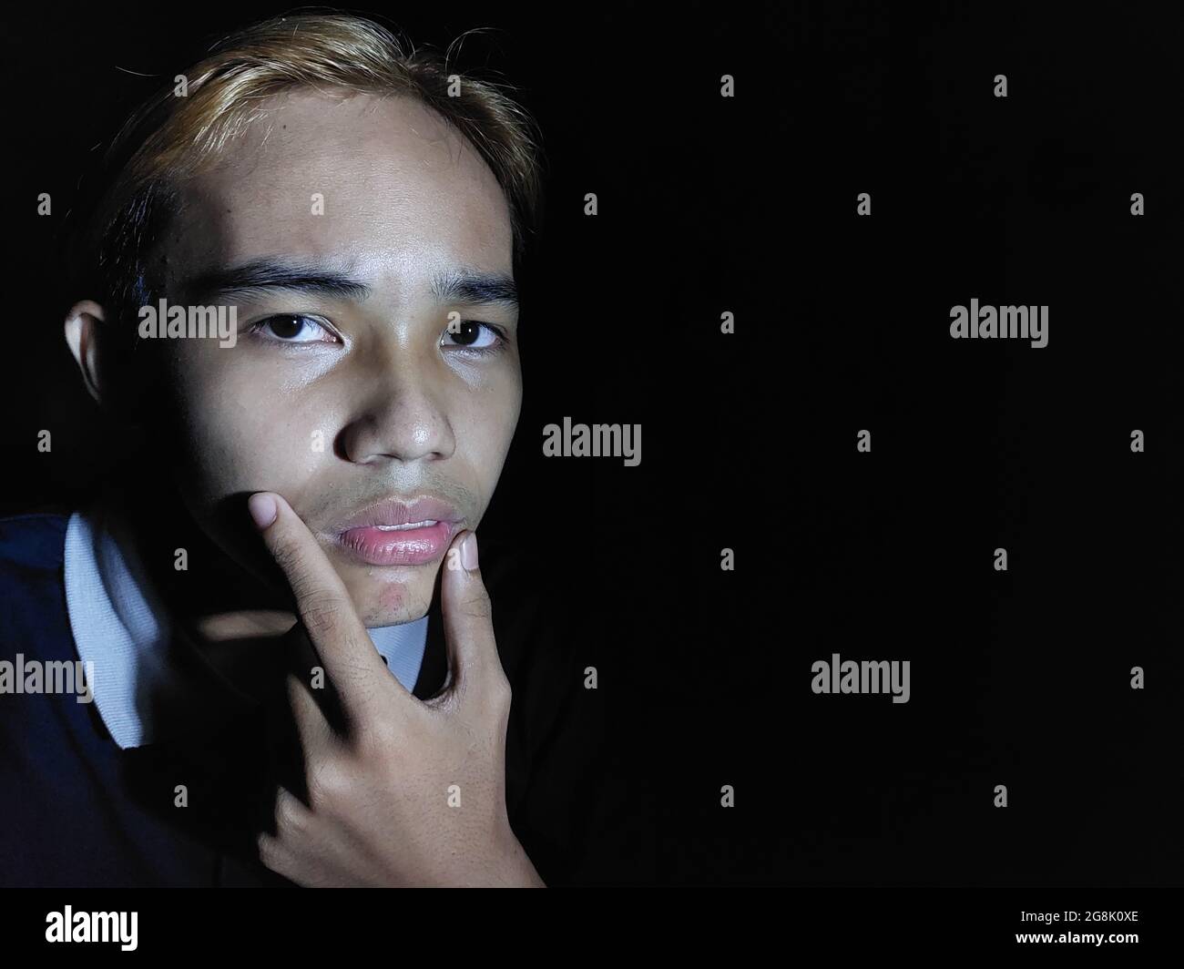 Adult Male Decision Making Isolated On Black Stock Photo - Alamy