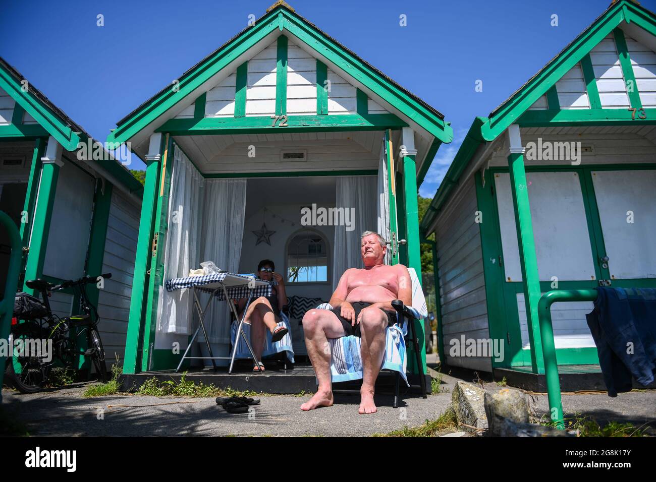 Paul Sheree from Swansea, relaxes outside a beach hut at Langland Bay ...