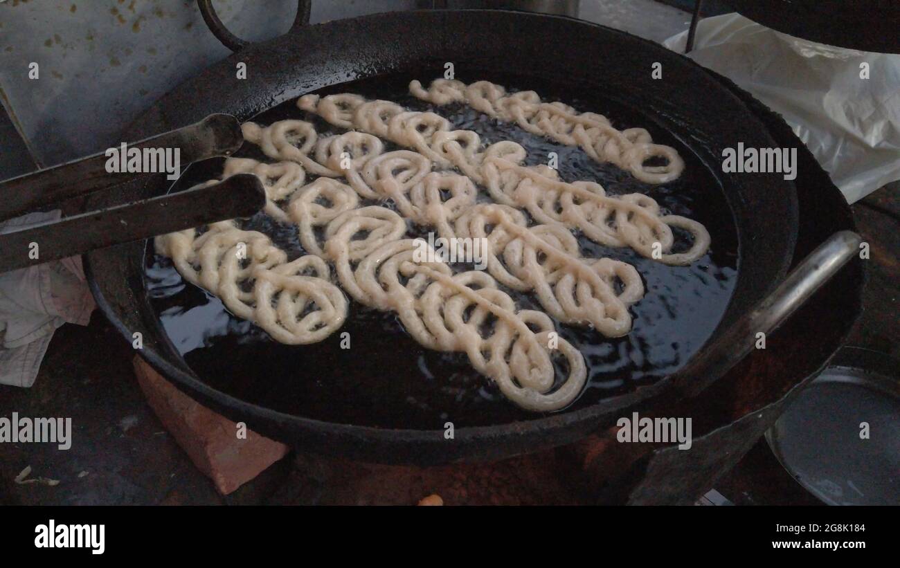 High-angle shot of the process of making Jalebi Stock Photo - Alamy