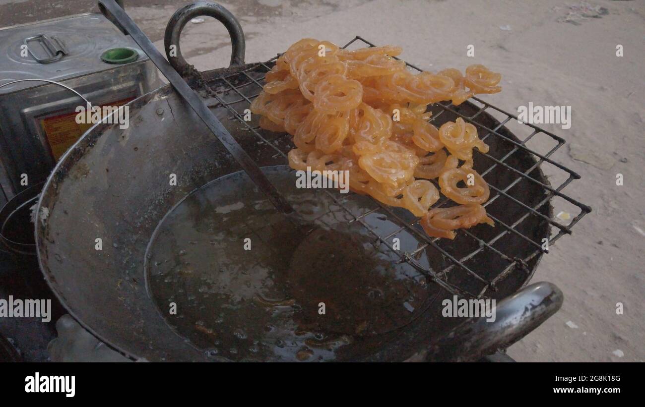 High-angle shot of the process of making Jalebi Stock Photo - Alamy