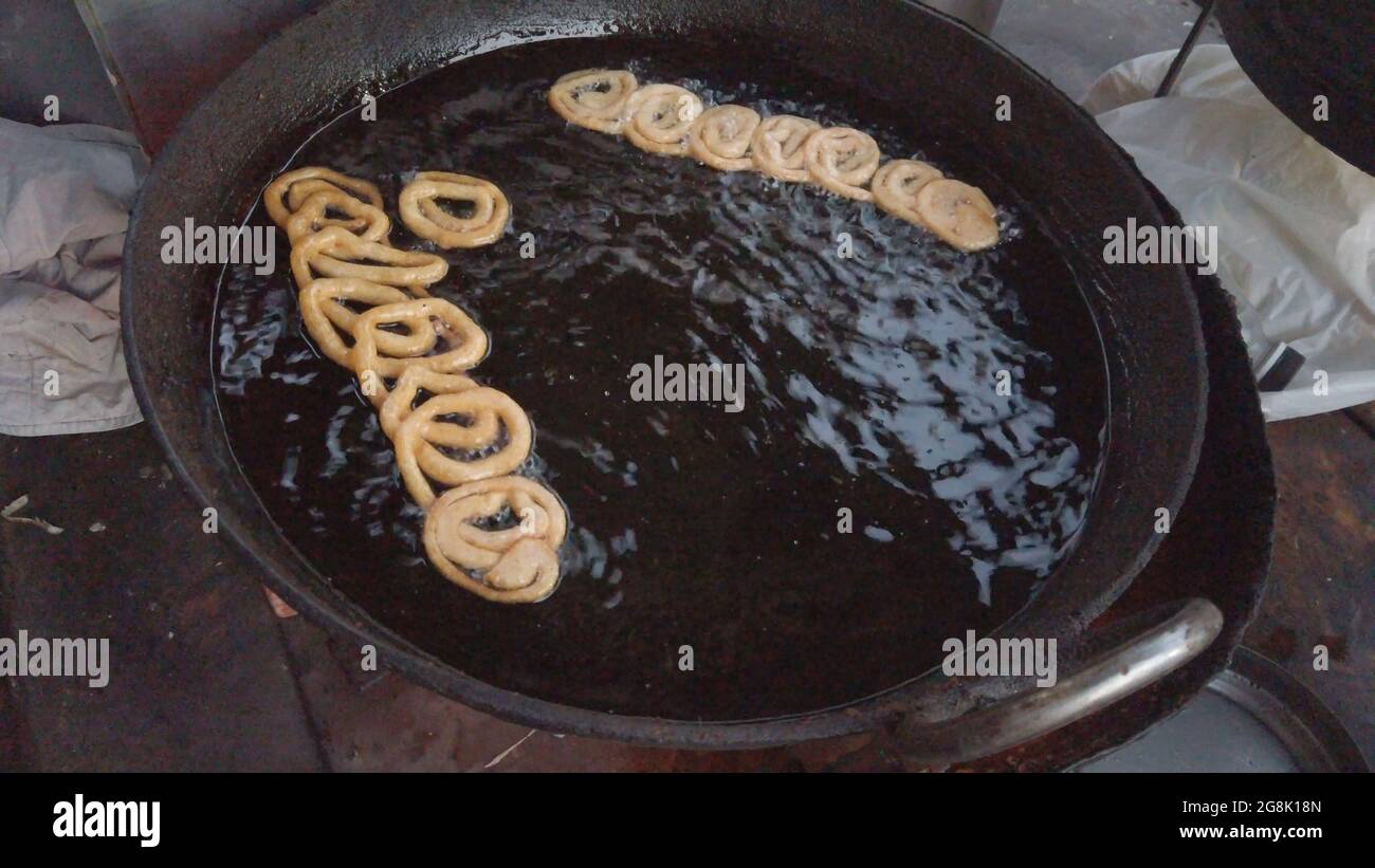 High-angle shot of the process of making Jalebi Stock Photo - Alamy