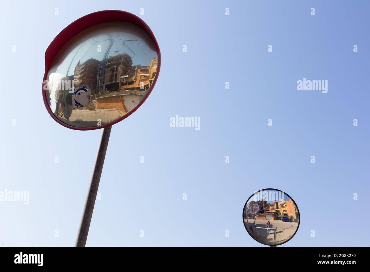 Wide-angle mirrors so drivers can see oncoming vehicles and avoid ...