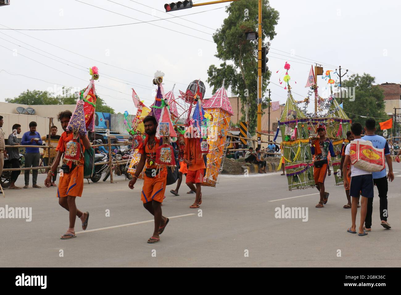 GHAZIABAD, INDIA - JULY 2019: A hindu devotee carrying kanwar on their ...