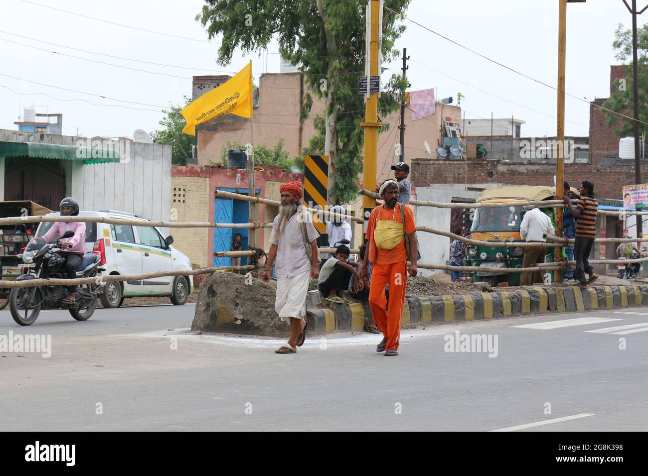 GHAZIABAD, INDIA - JULY 2019: A hindu devotee carrying kanwar on their ...