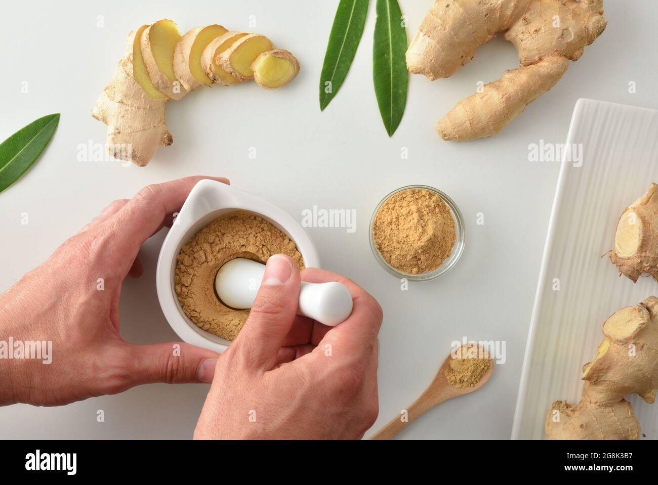 Making ginger powder as a spice to flavor food dishes with ginger root ...