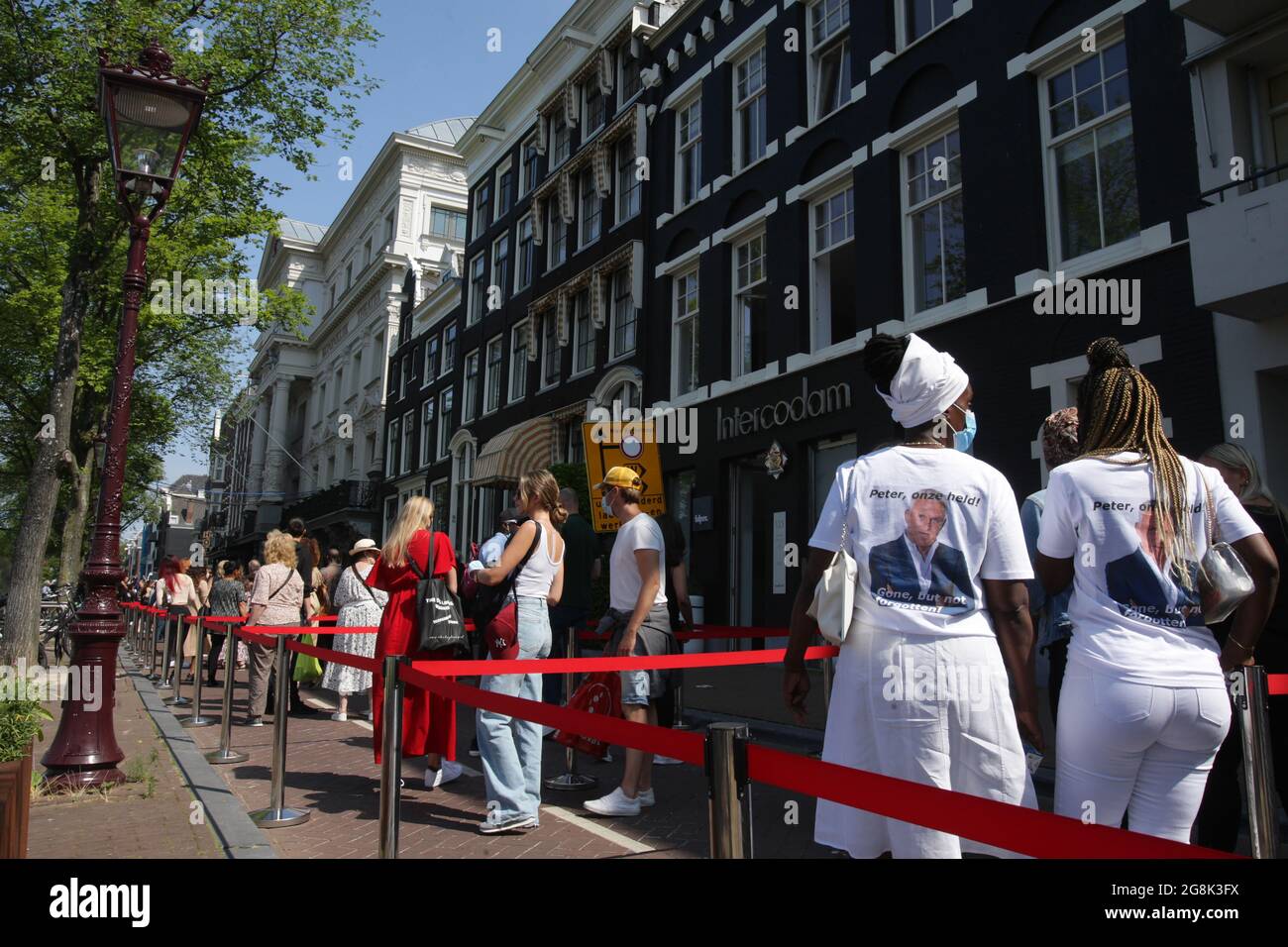 Amsterdam, Netherlannds. 21st July, 2021. People queue in line to ...