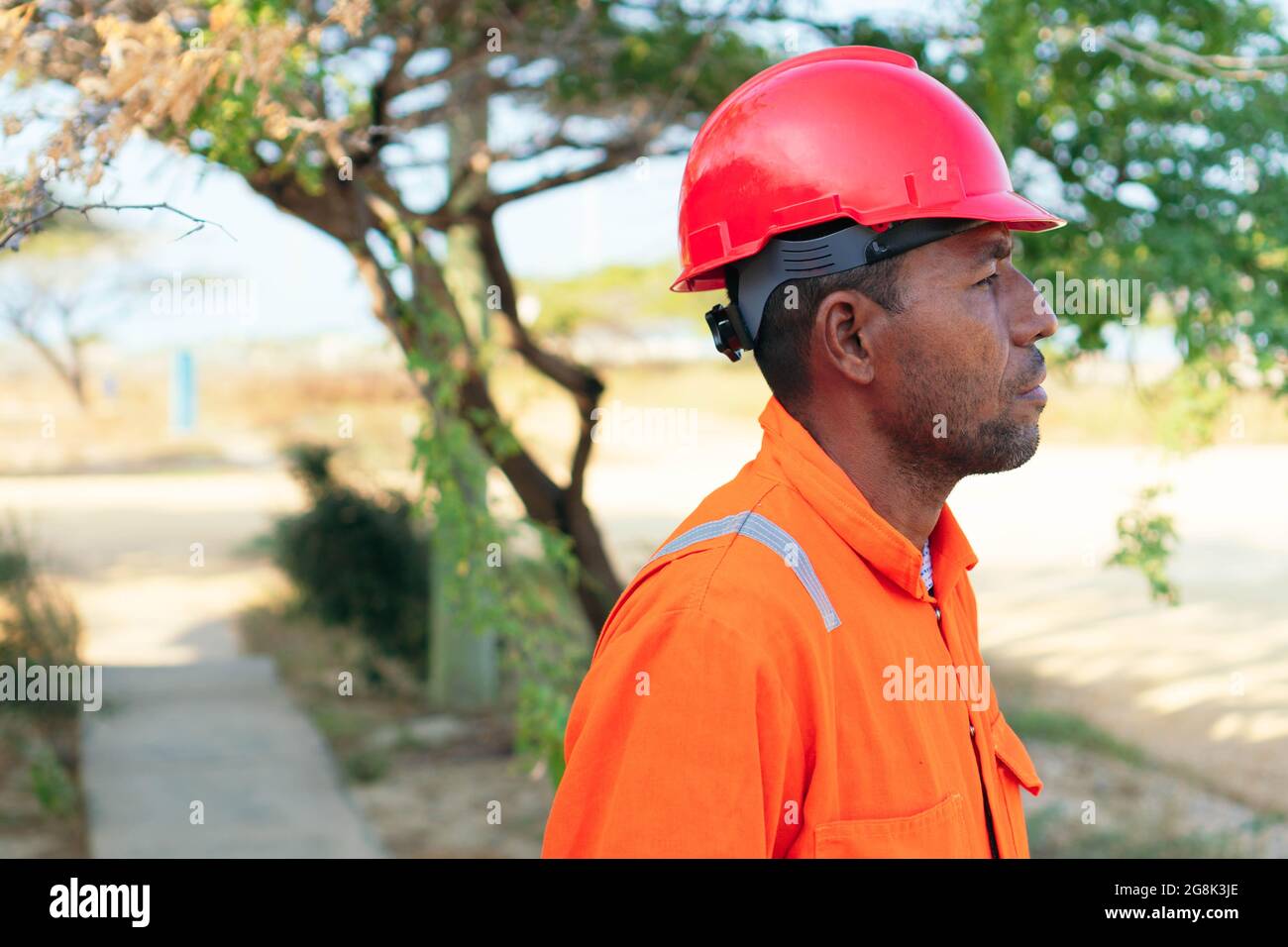 Man in orange uniform hi-res stock photography and images - Alamy
