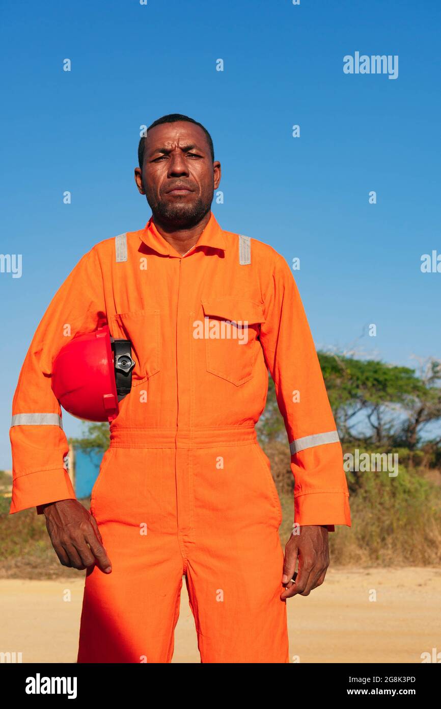 Orange color uniform hi-res stock photography and images - Alamy