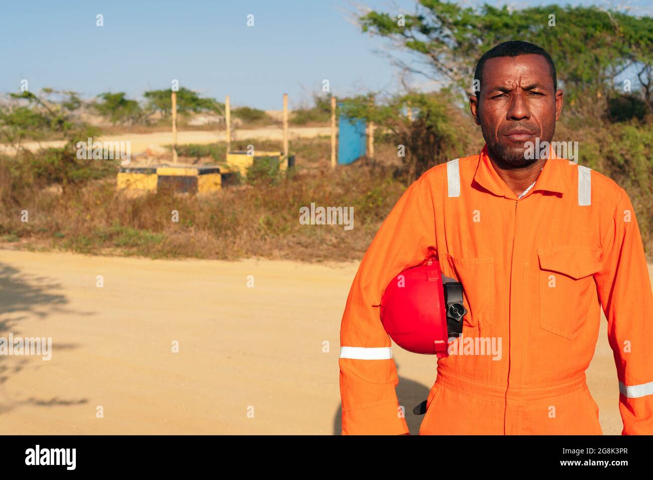Handsome male repairman posing hi-res stock photography and images - Alamy