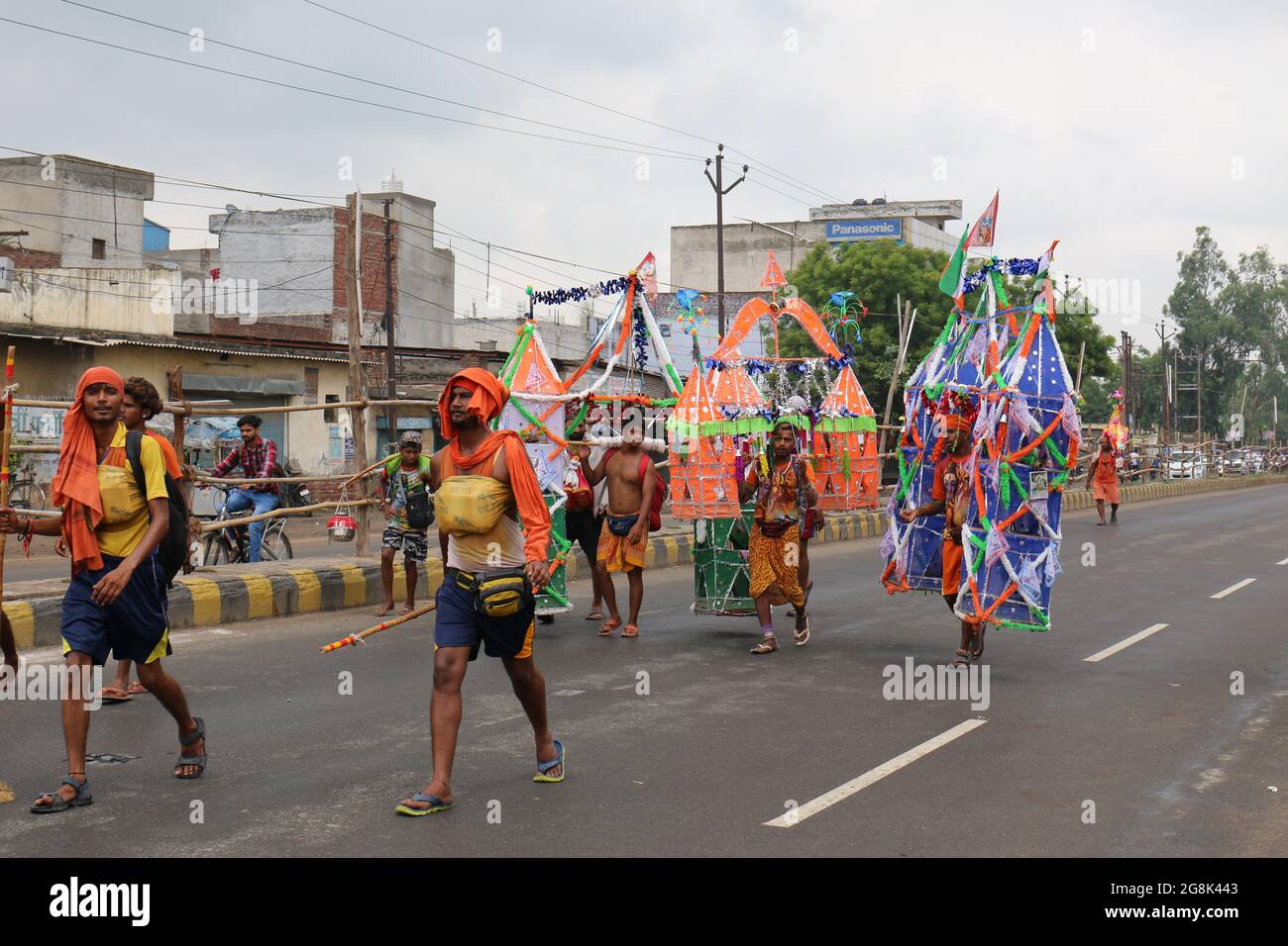 GHAZIABAD, INDIA - JULY 2019: A hindu devotee carrying kanwar on their ...