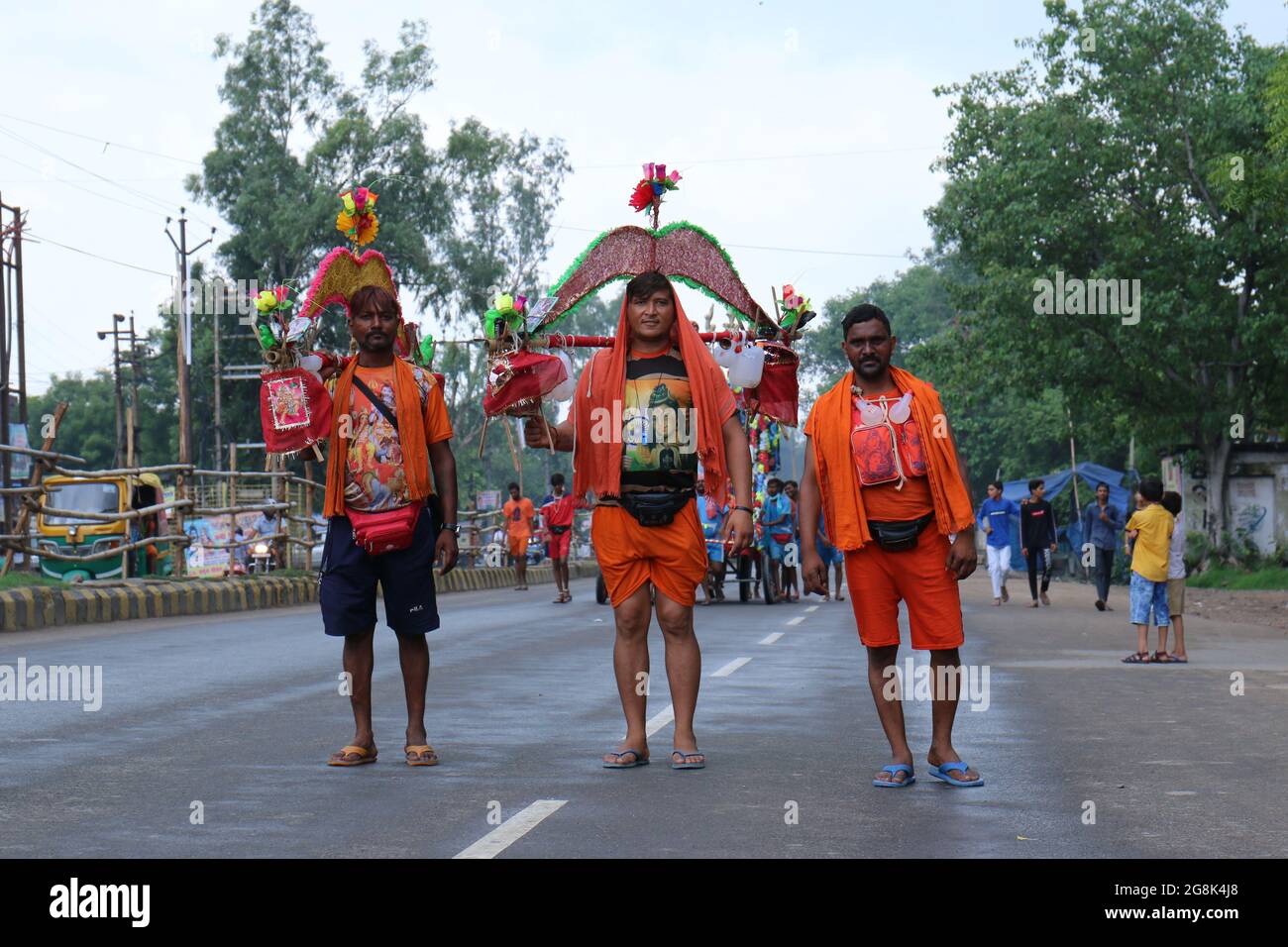 GHAZIABAD, INDIA - JULY 2019: A hindu devotee carrying kanwar on their ...