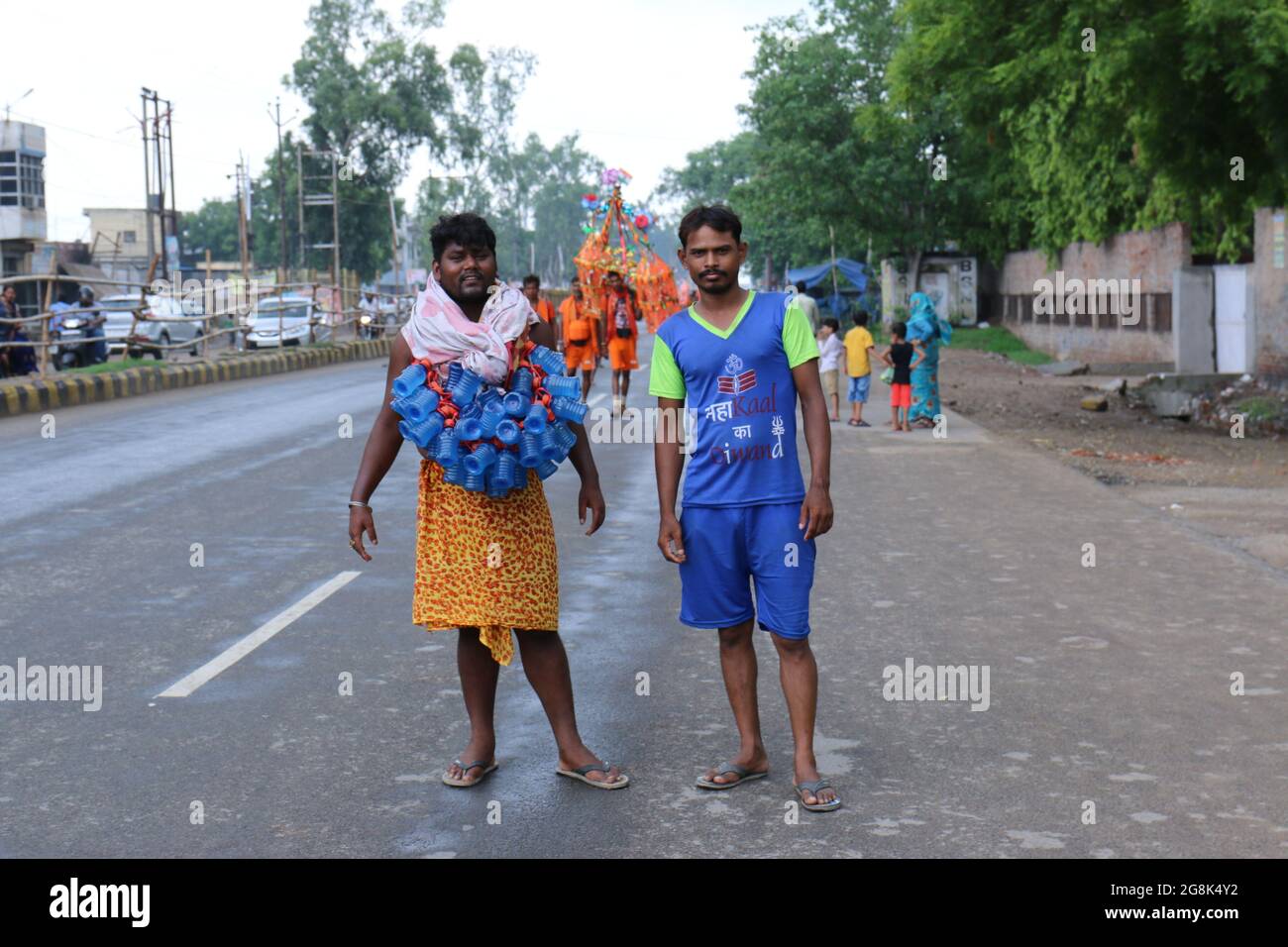 GHAZIABAD, INDIA - JULY 2019: A hindu devotee carrying kanwar on their ...