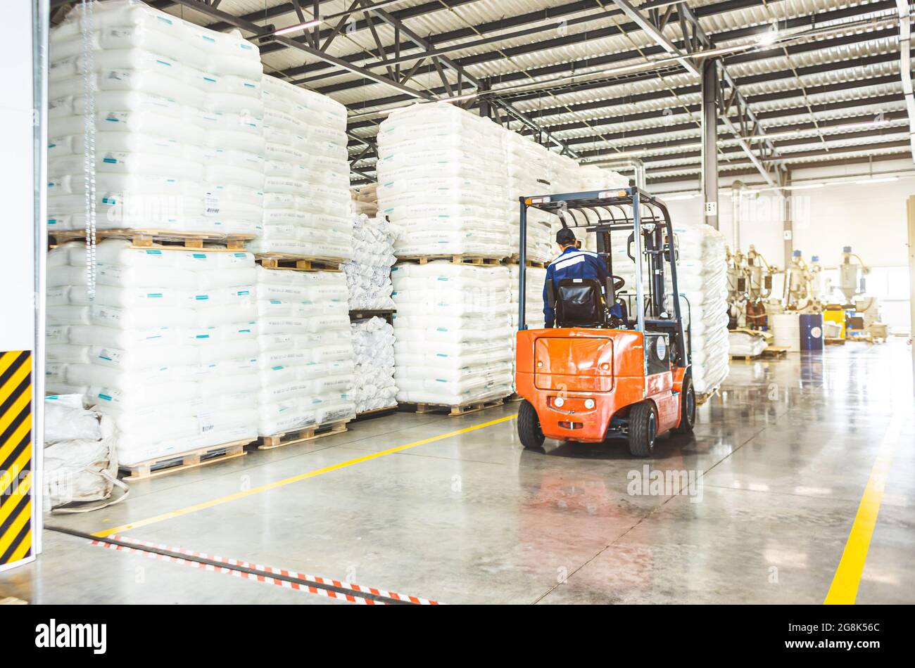 Forklift loader for warehouse works outdoors with risen forks Stock ...