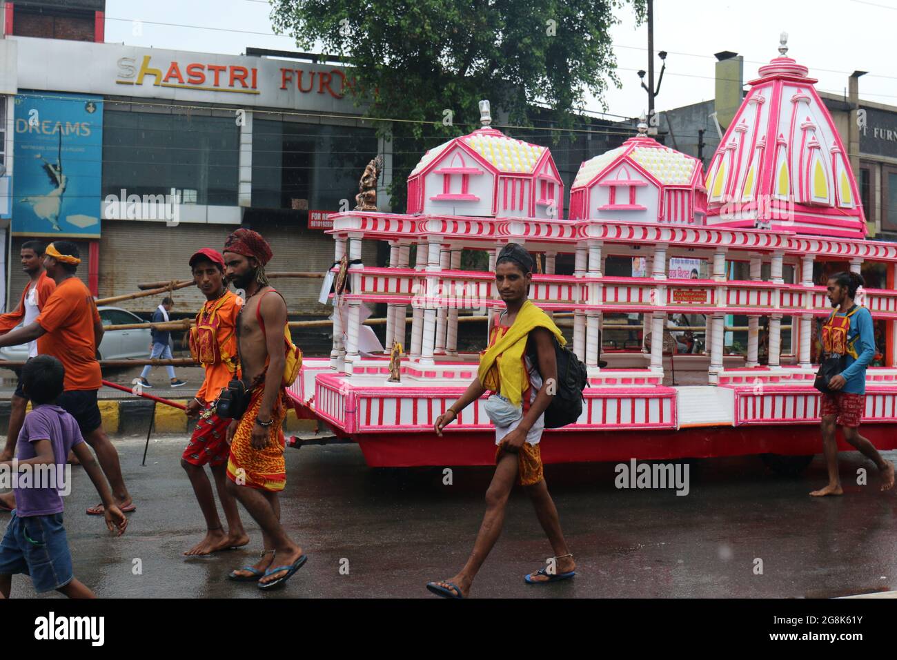 GHAZIABAD, INDIA - JULY 2019: A hindu devotee carrying kanwar on their ...