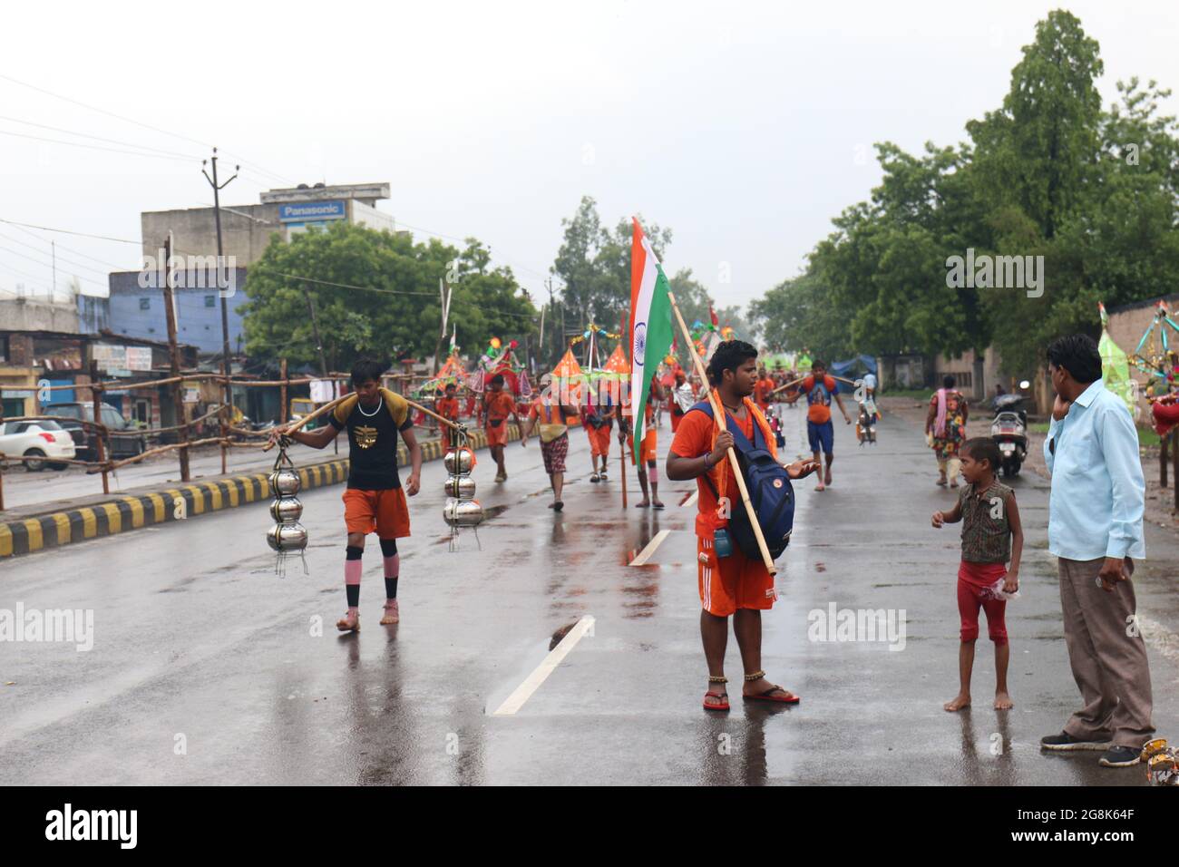 GHAZIABAD, INDIA - JULY 2019: A hindu devotee carrying kanwar on their ...